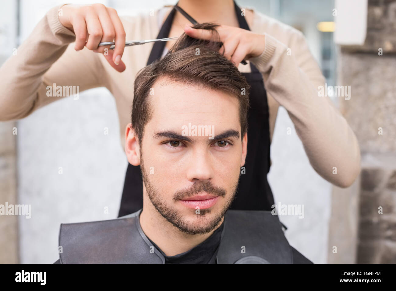 Man getting his hair trimmed Stock Photo - Alamy