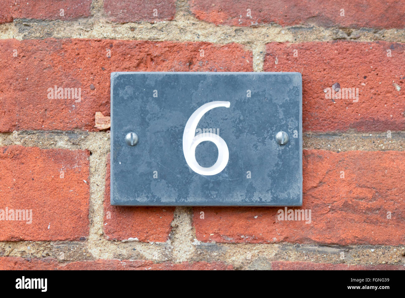 House number 6 slate sign on wall Stock Photo - Alamy