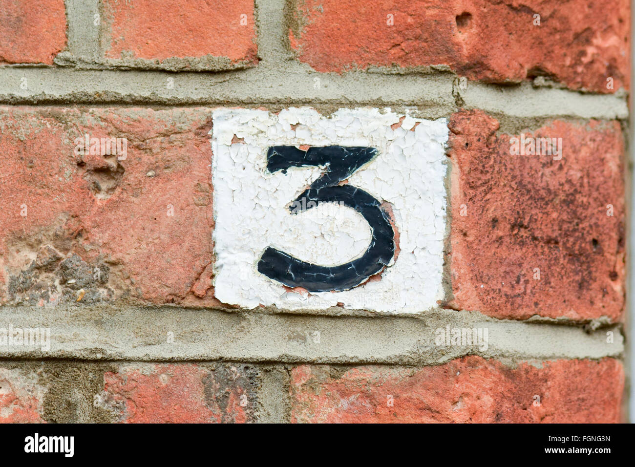 House number 33 sign painted on wall Stock Photo - Alamy