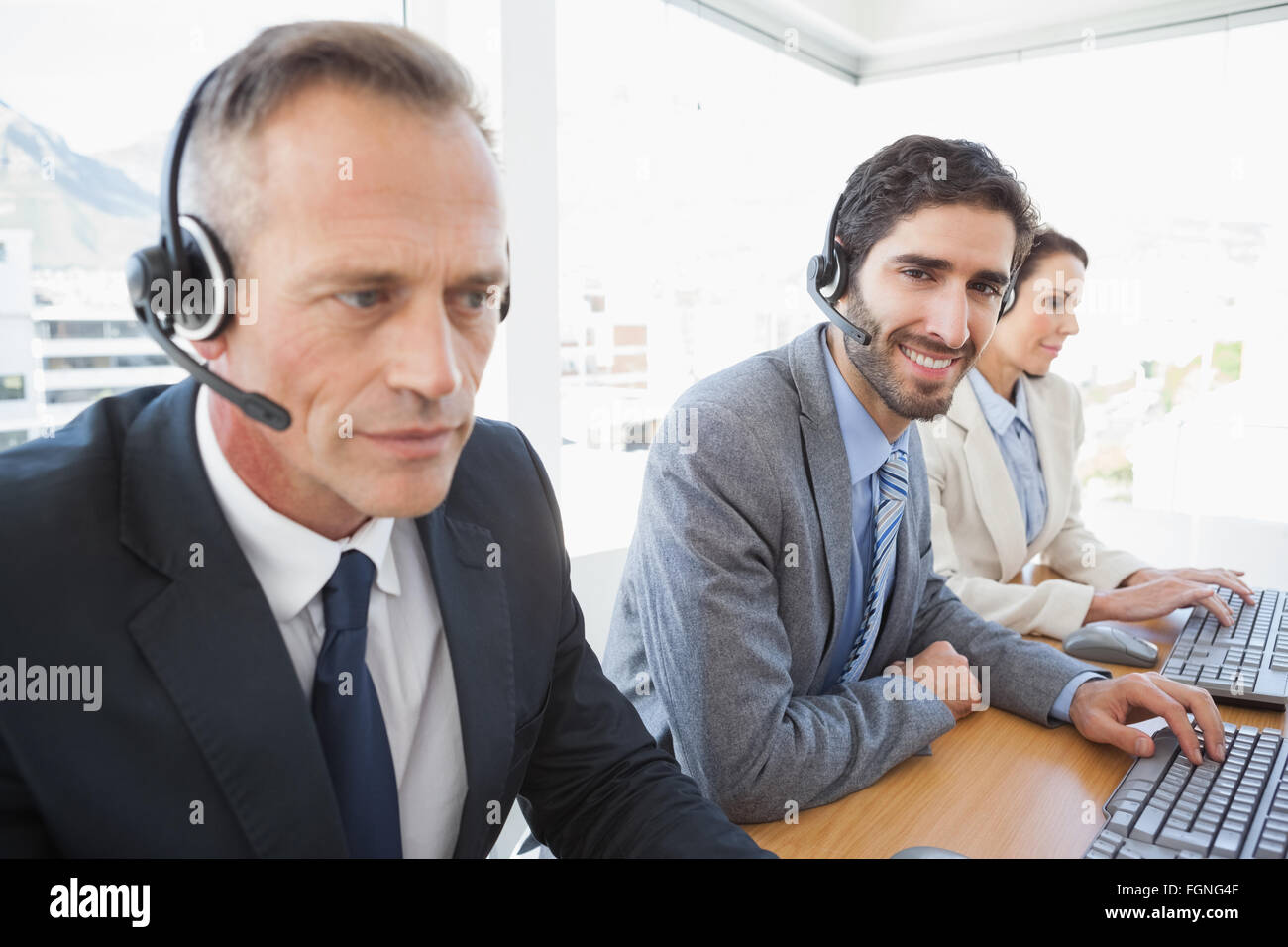 Business team working at the call center Stock Photo - Alamy