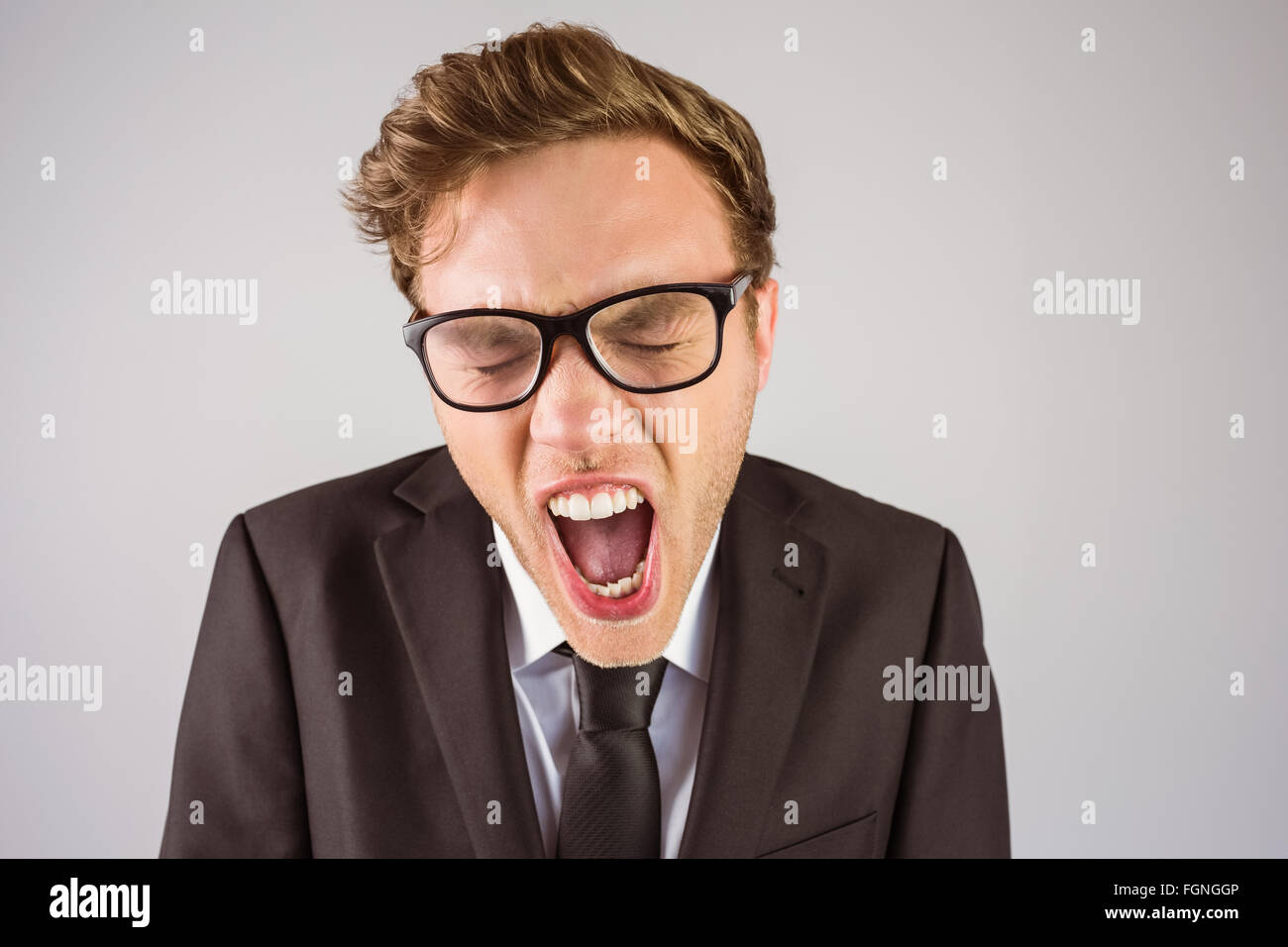 Young angry businessman shouting at camera Stock Photo - Alamy