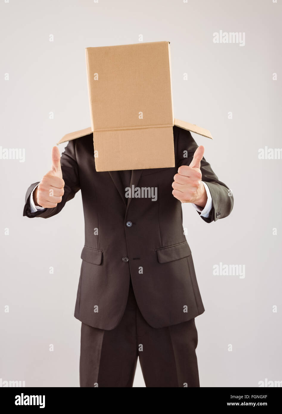 Anonymous businessman with thumbs up Stock Photo - Alamy