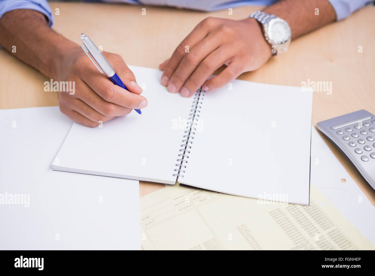 Hand writing documents at desk Stock Photo - Alamy