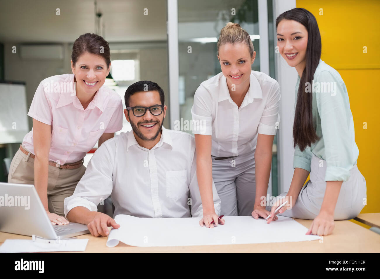 Architecture team working together at desk Stock Photo - Alamy