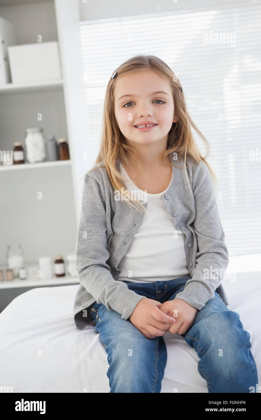 Small girl looking at the camera Stock Photo - Alamy