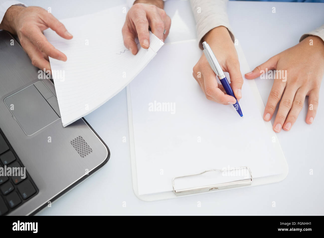 Close up of notes being written Stock Photo - Alamy