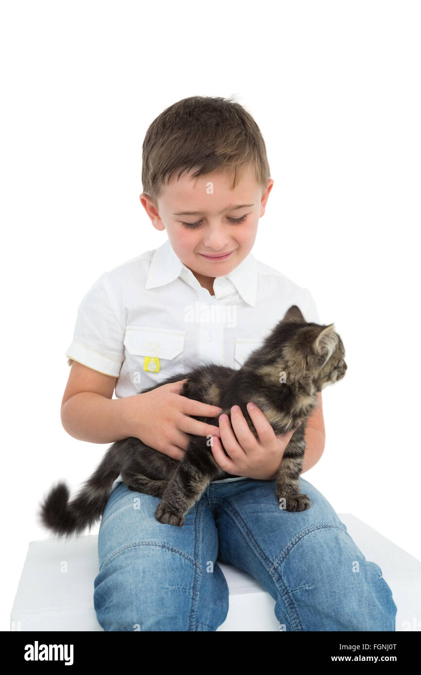 Child cat cuddling hi-res stock photography and images - Alamy