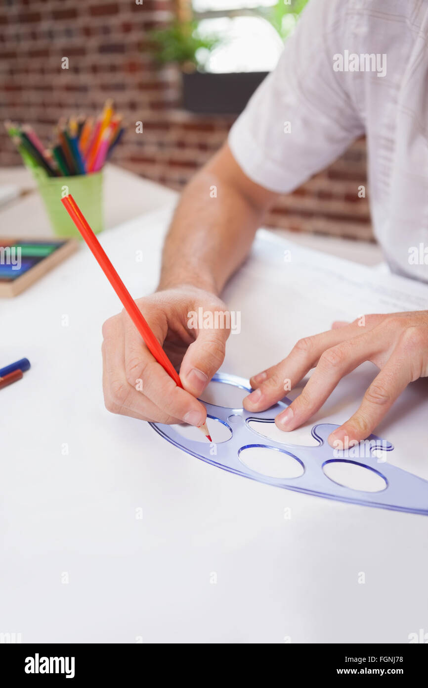 Designer drawing the old fashioned way Stock Photo - Alamy