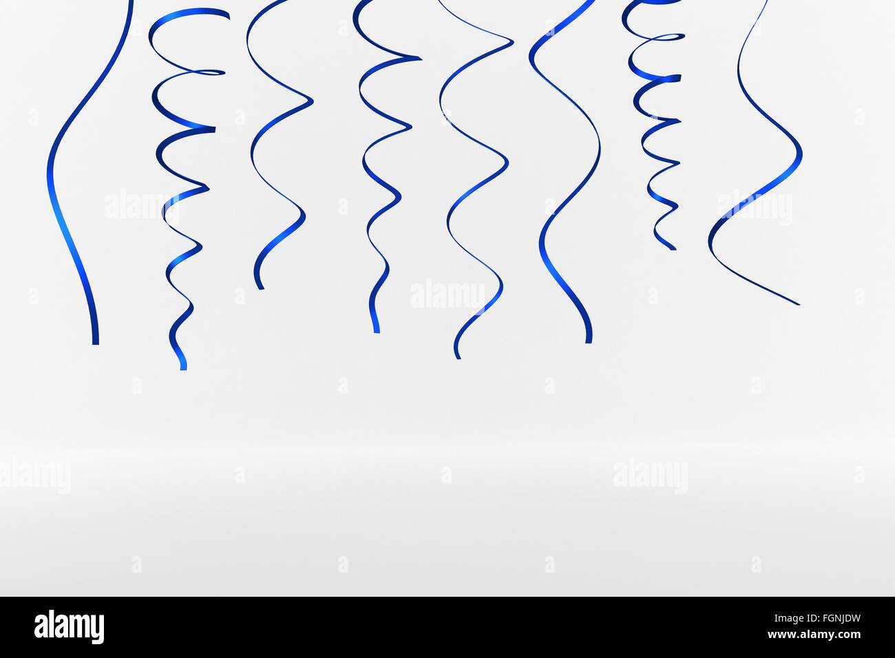 Hanging blue streamer ribbon decorations Stock Photo - Alamy