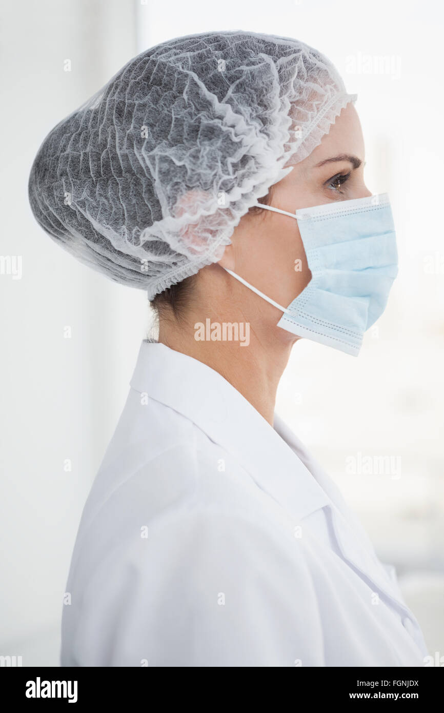 Doctor wearing a surgical mask Stock Photo - Alamy