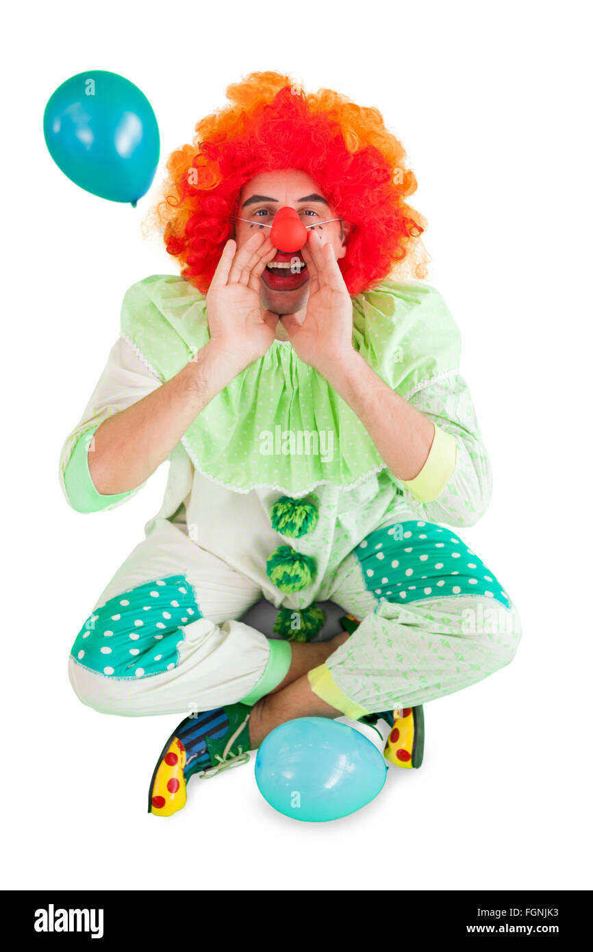 Funny clown shouting at camera Stock Photo - Alamy