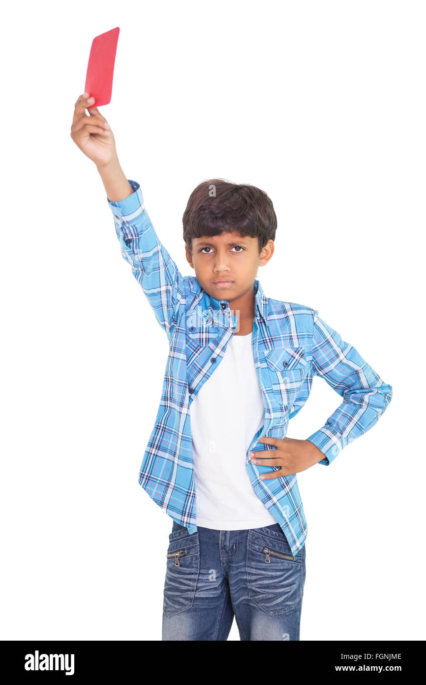Cute boy showing red card Stock Photo - Alamy