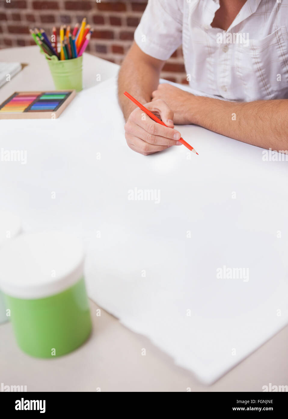 Designer drawing the old fashioned way Stock Photo - Alamy