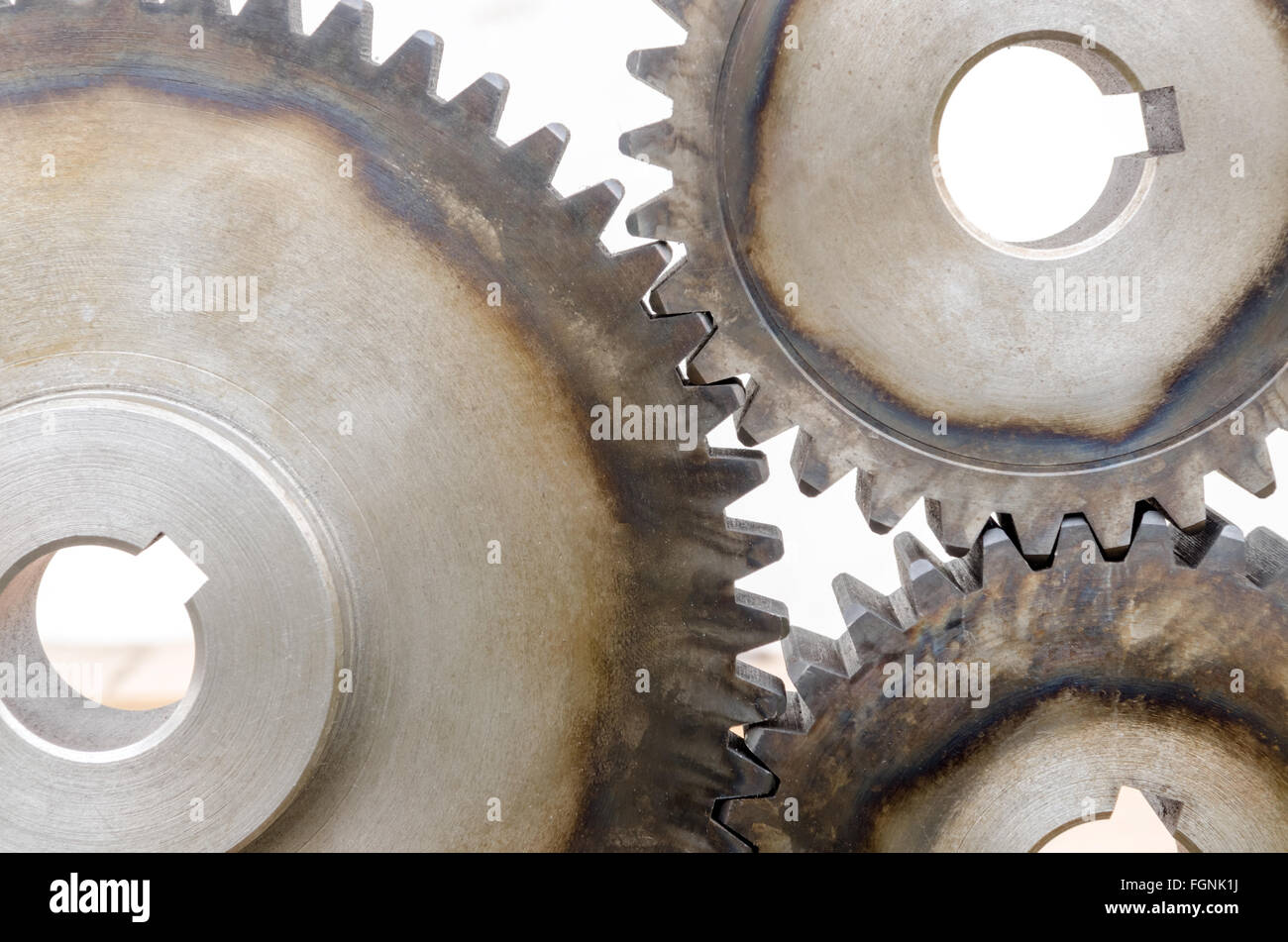 A huge set of rusty metal gears on a white background Stock Photo - Alamy