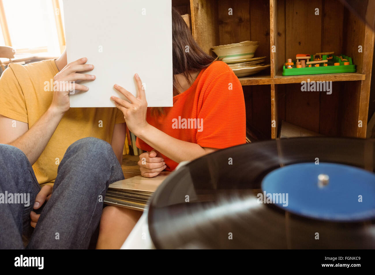 Young couple listening vinyl hi-res stock photography and images - Alamy