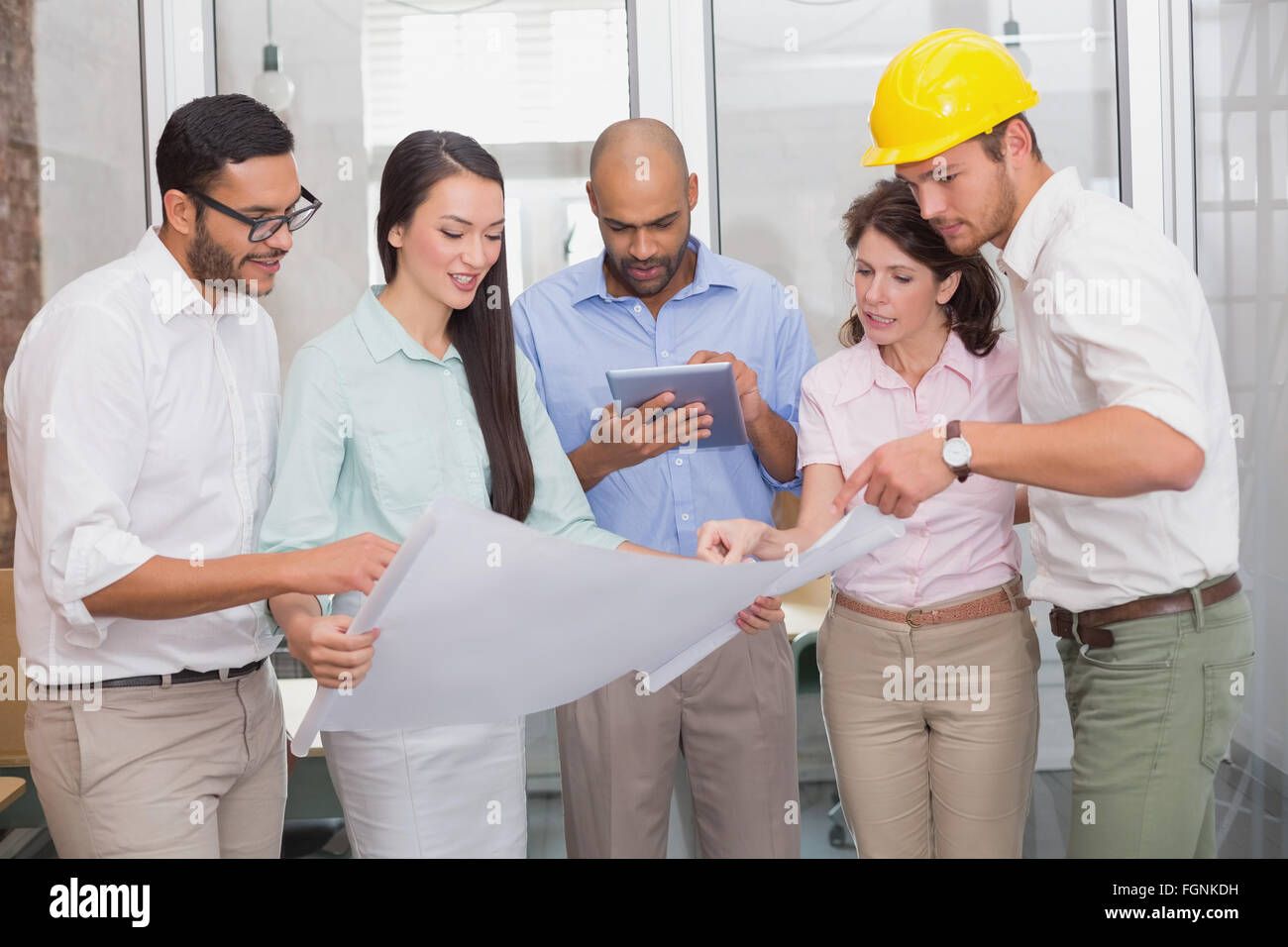Casual architecture team working together Stock Photo - Alamy