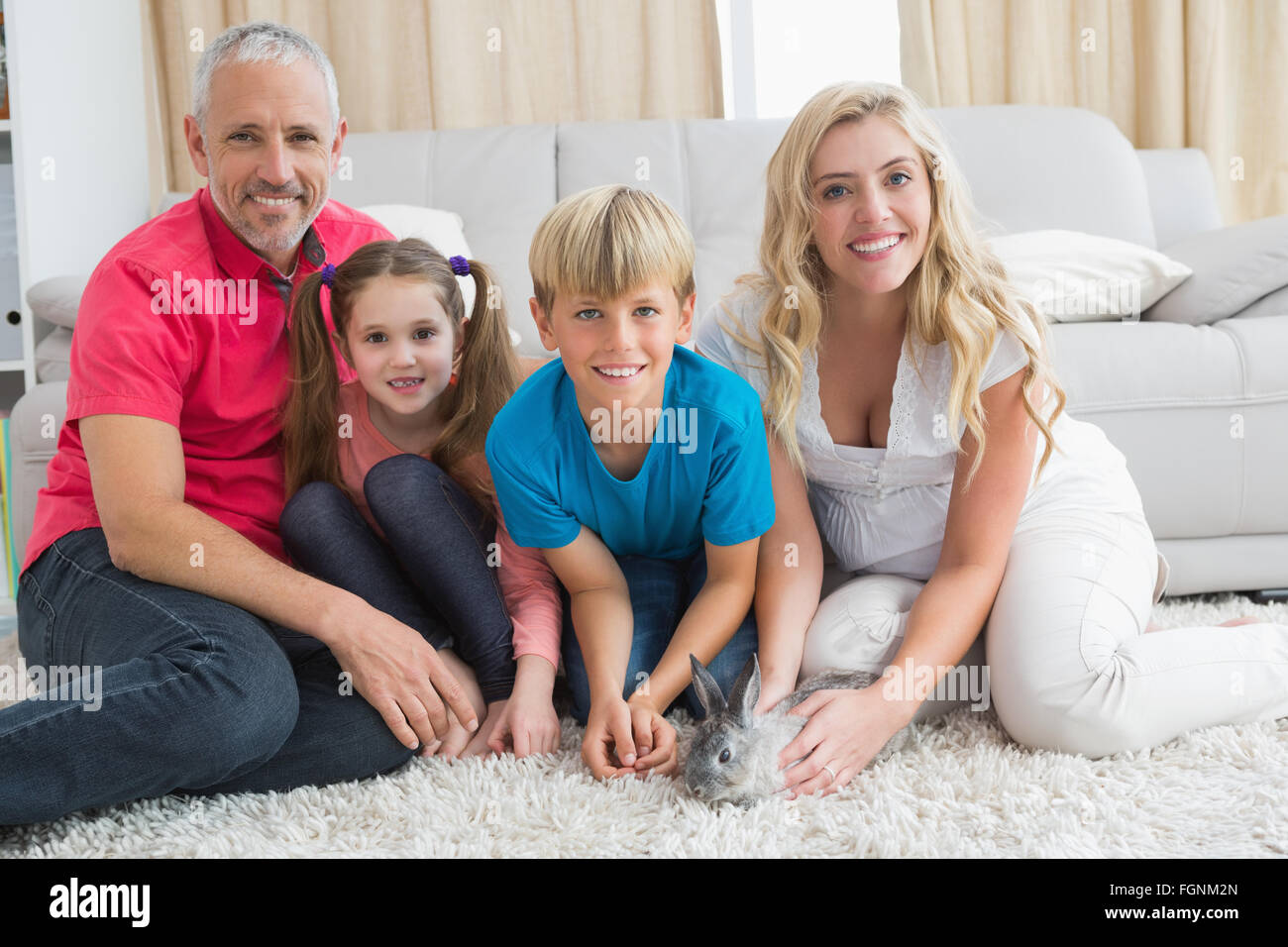 Child petting bunny hi-res stock photography and images - Alamy