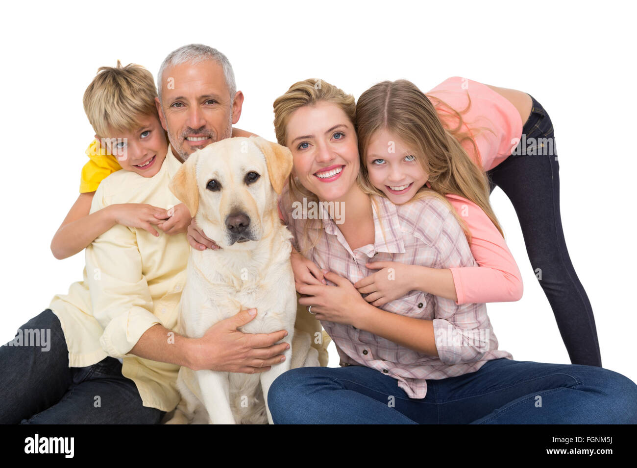 Happy family with their pet dog Stock Photo - Alamy