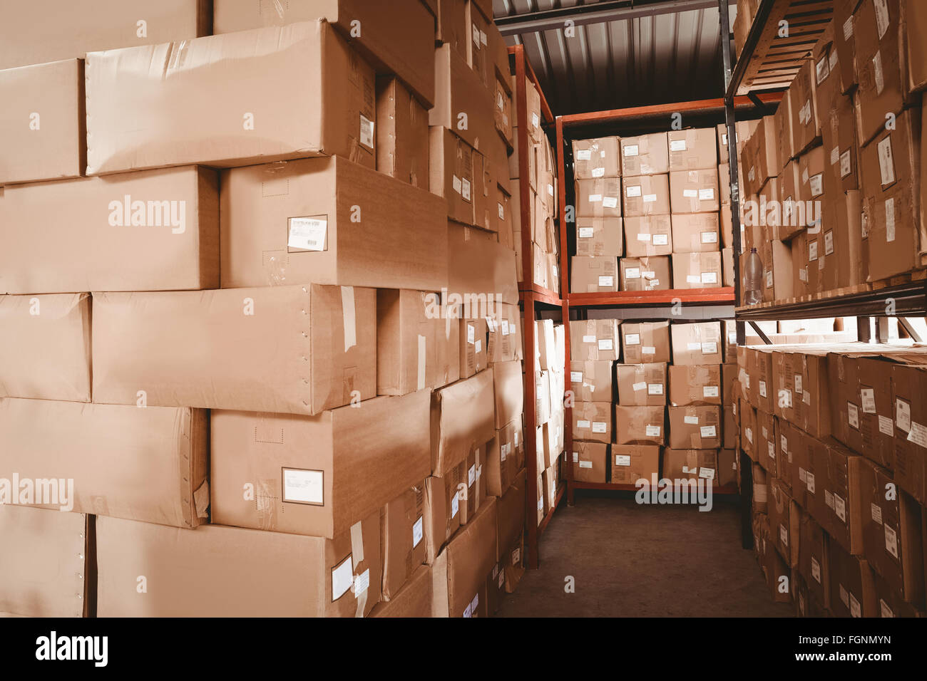 Shelves with boxes in warehouse Stock Photo - Alamy