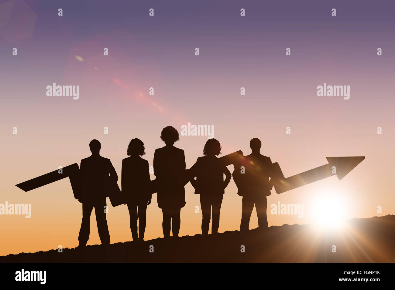 Composite image of business team with arrow Stock Photo - Alamy