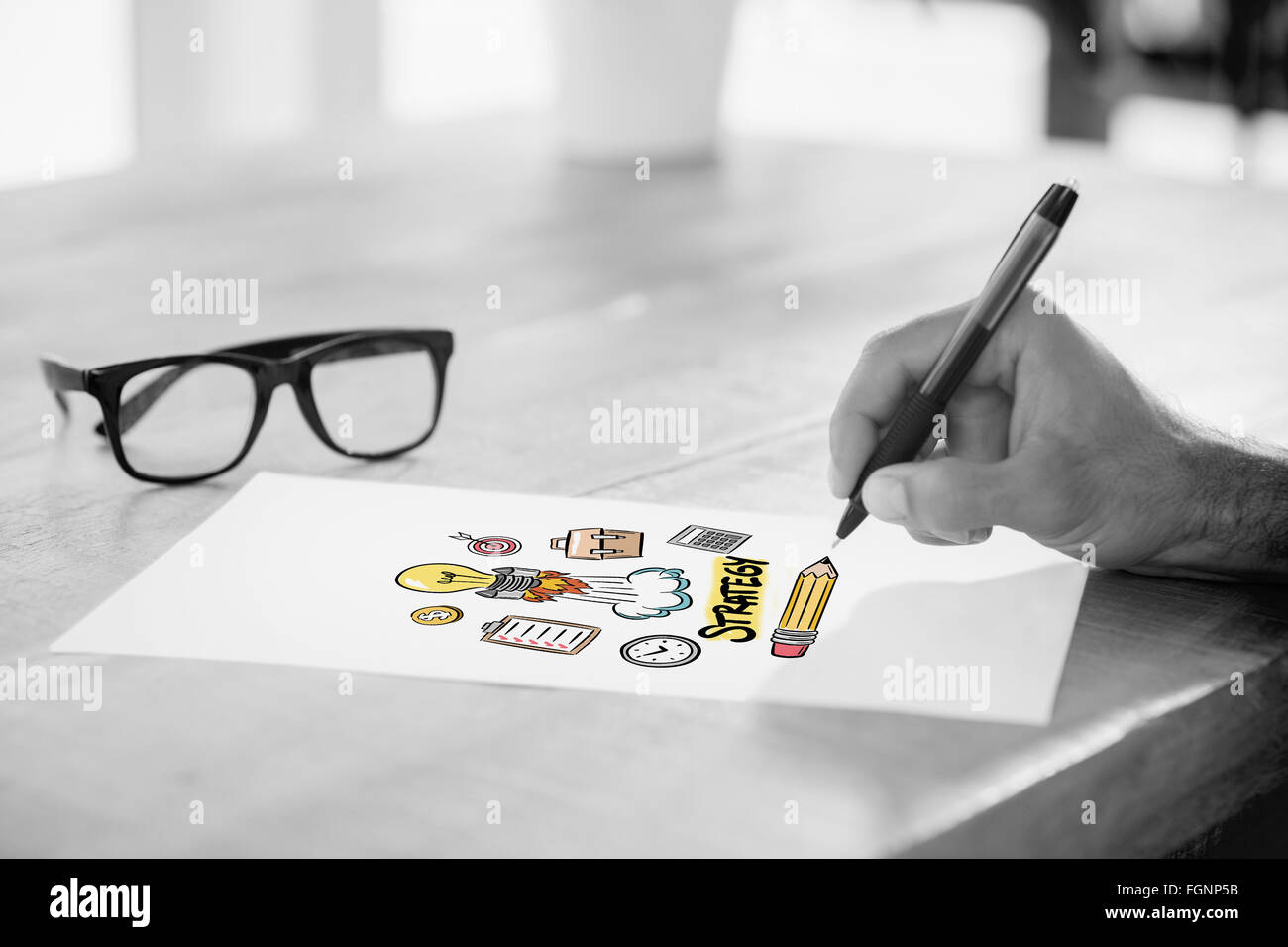 Composite image of side view of hand writing on white page on working ...