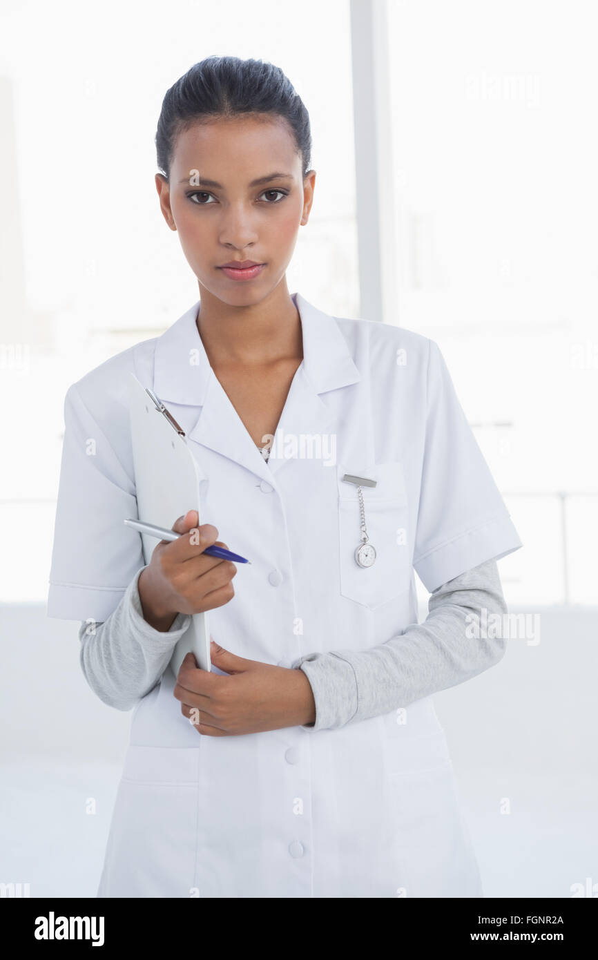Doctor looking at the camera Stock Photo - Alamy