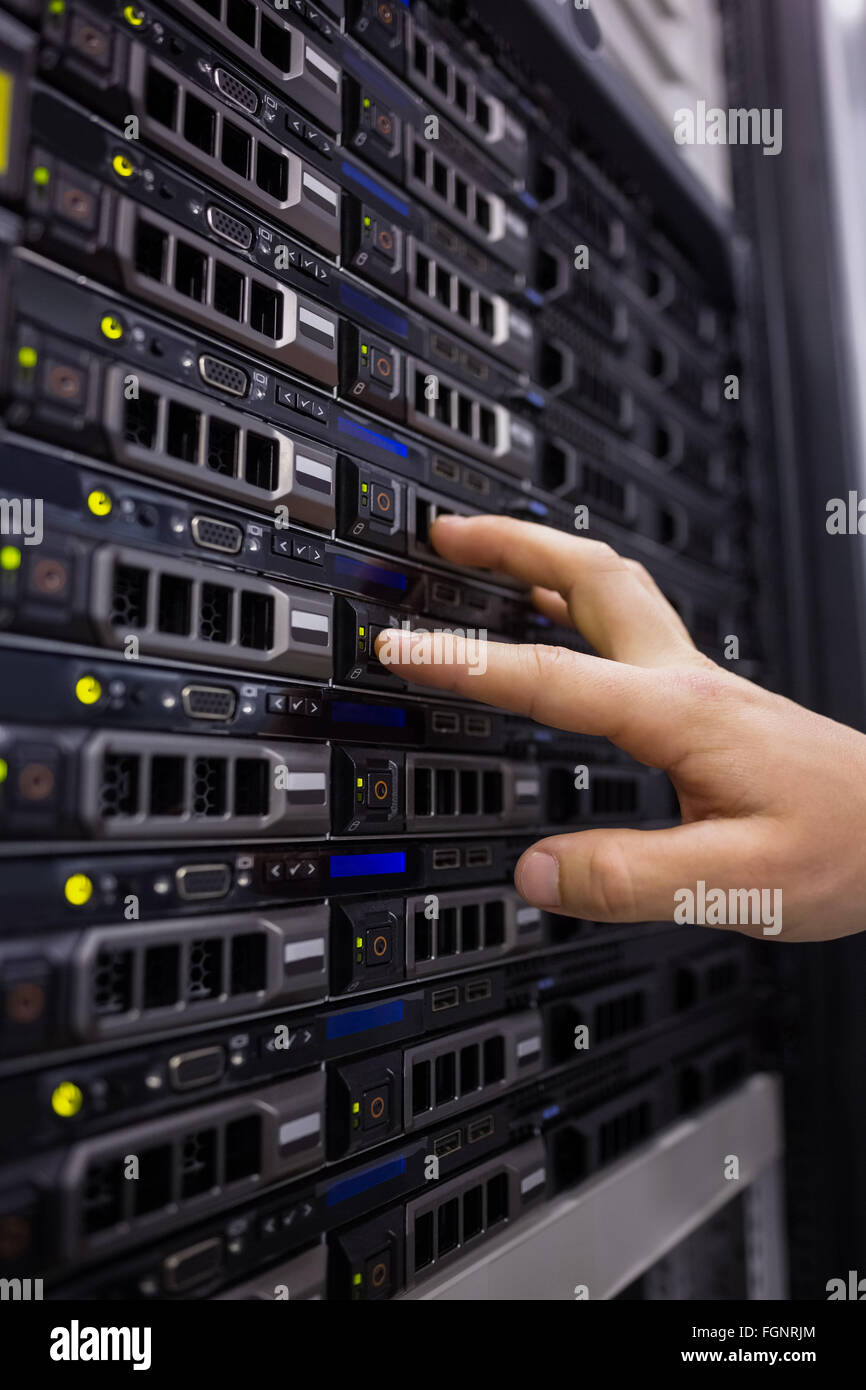 Technician working on server tower Stock Photo - Alamy