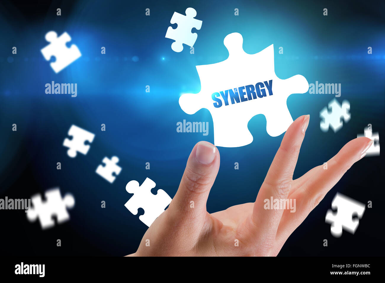 Synergy against blue background with vignette Stock Photo - Alamy