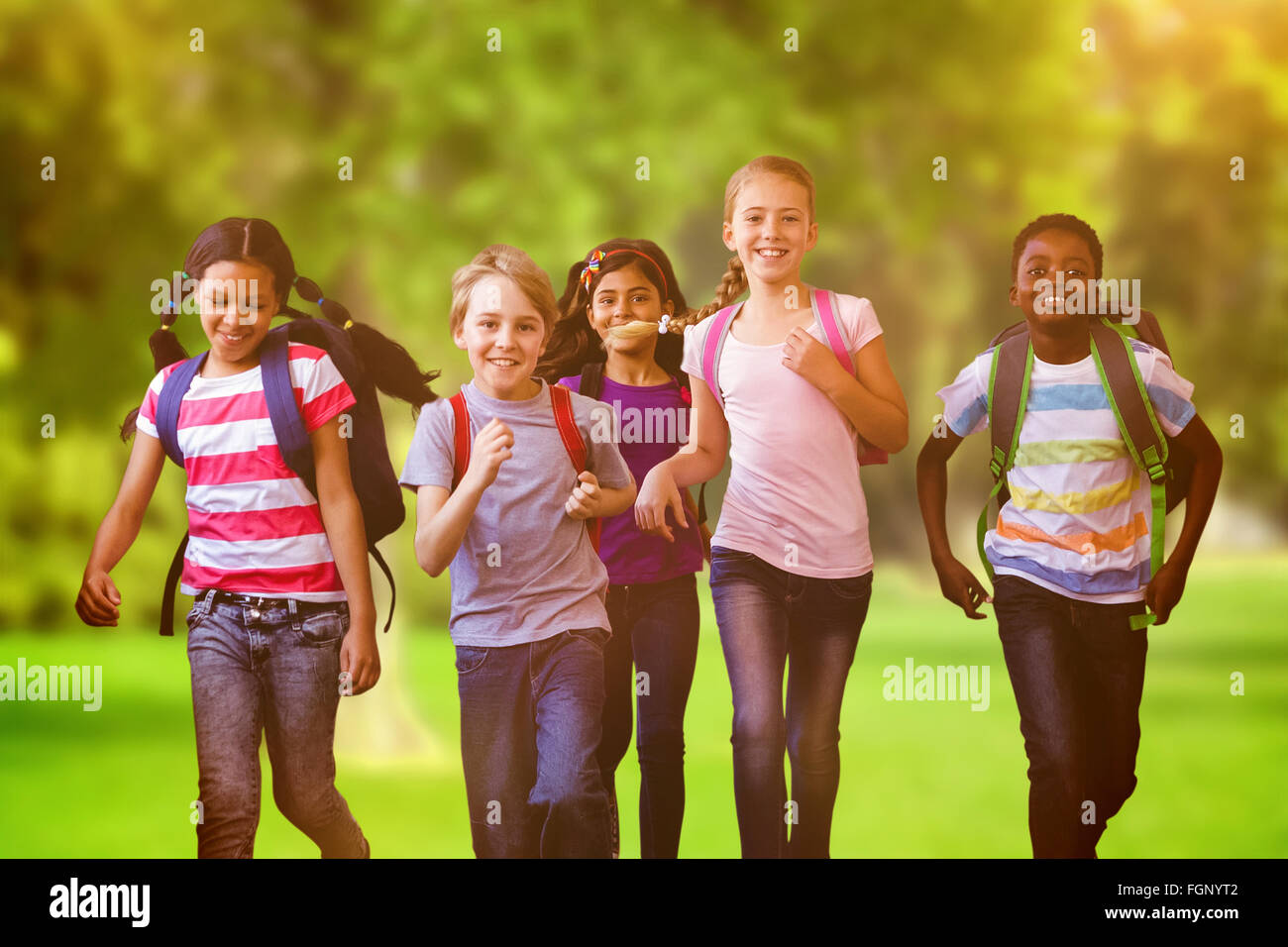 Composite image of school kids running in school corridor Stock Photo ...