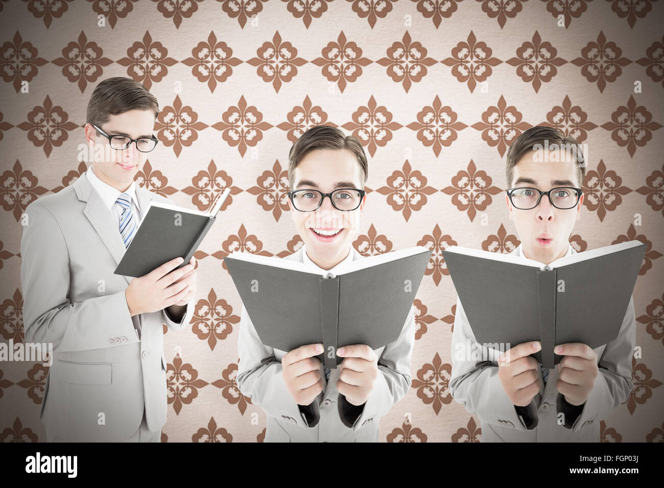 Composite image of nerd reading book Stock Photo - Alamy