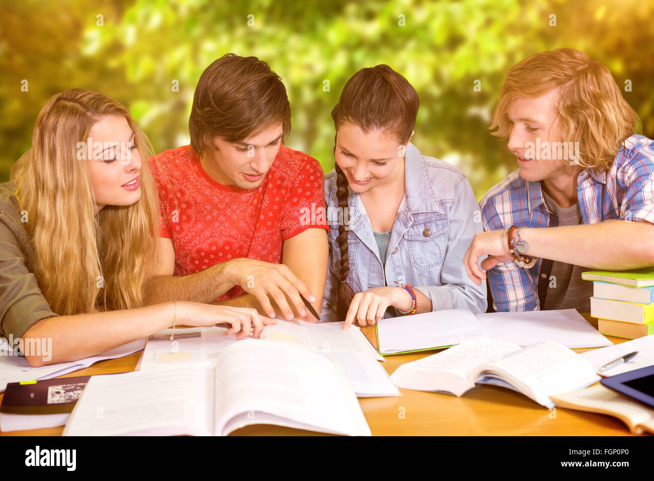 Composite image of college students doing homework in library Stock ...
