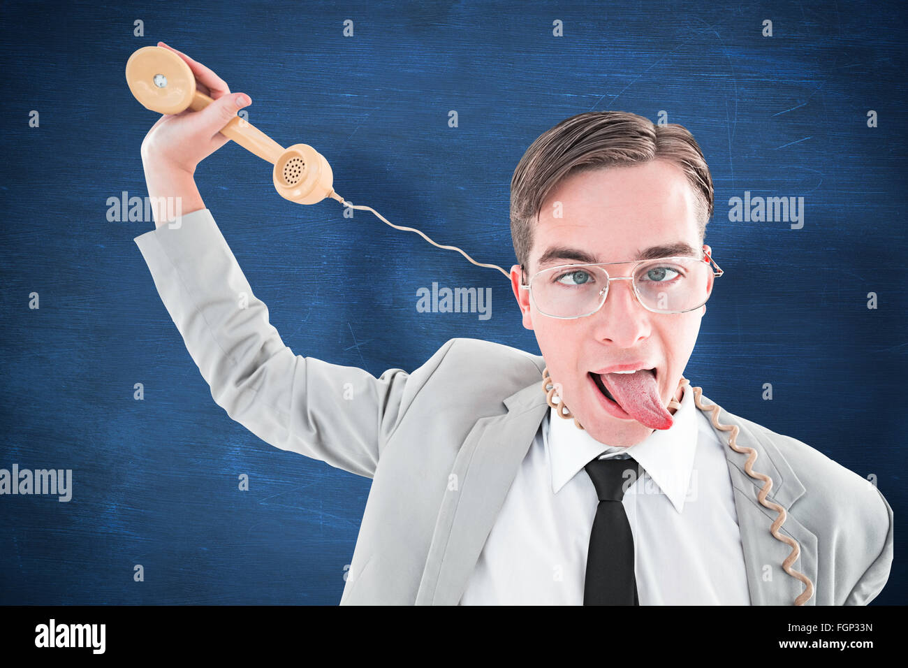 Composite image of geeky businessman being strangled by phone cord ...