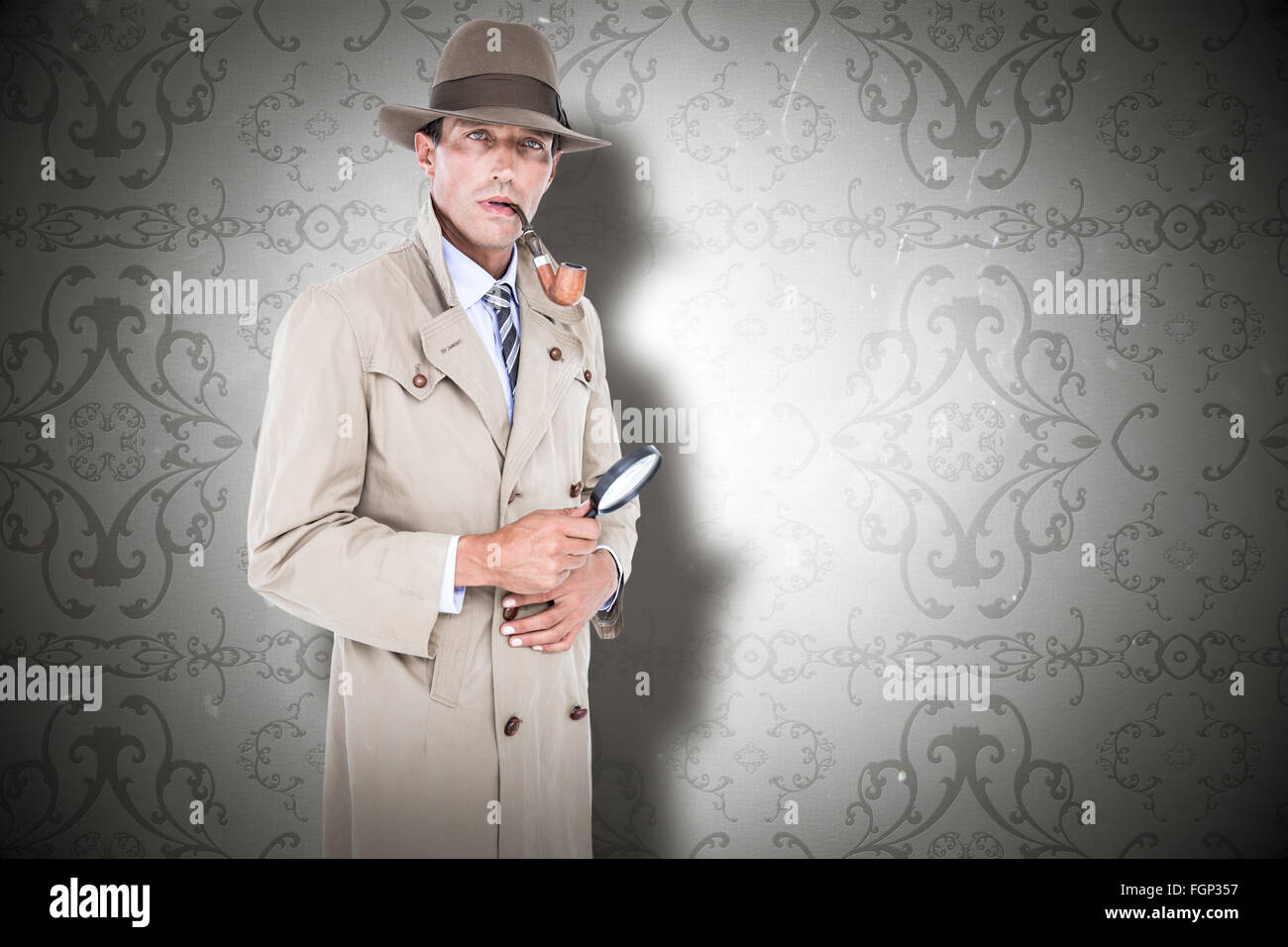 Composite image of spy looking through magnifier Stock Photo - Alamy