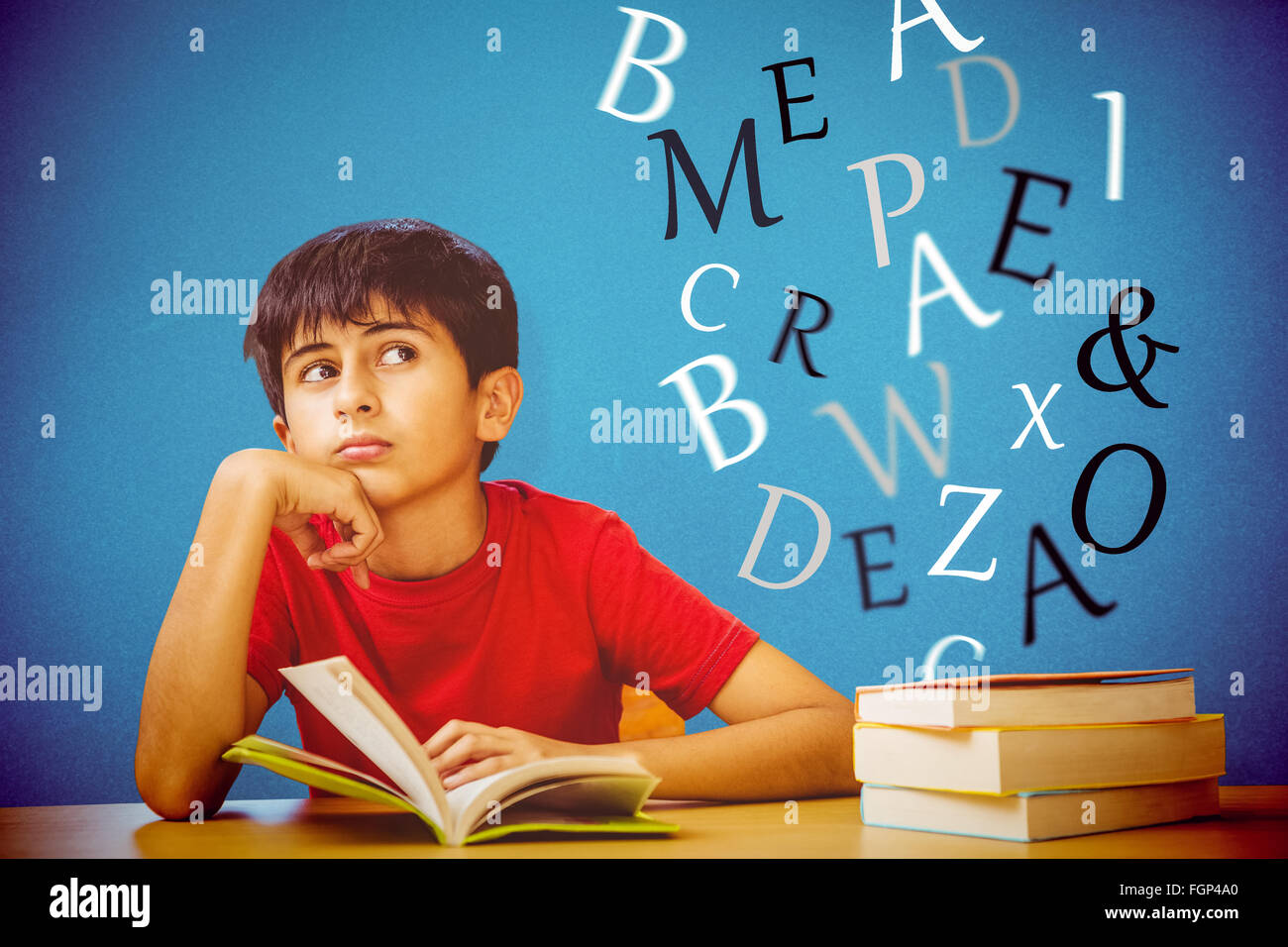 Composite image of thoughtful boy reading book in library Stock Photo ...