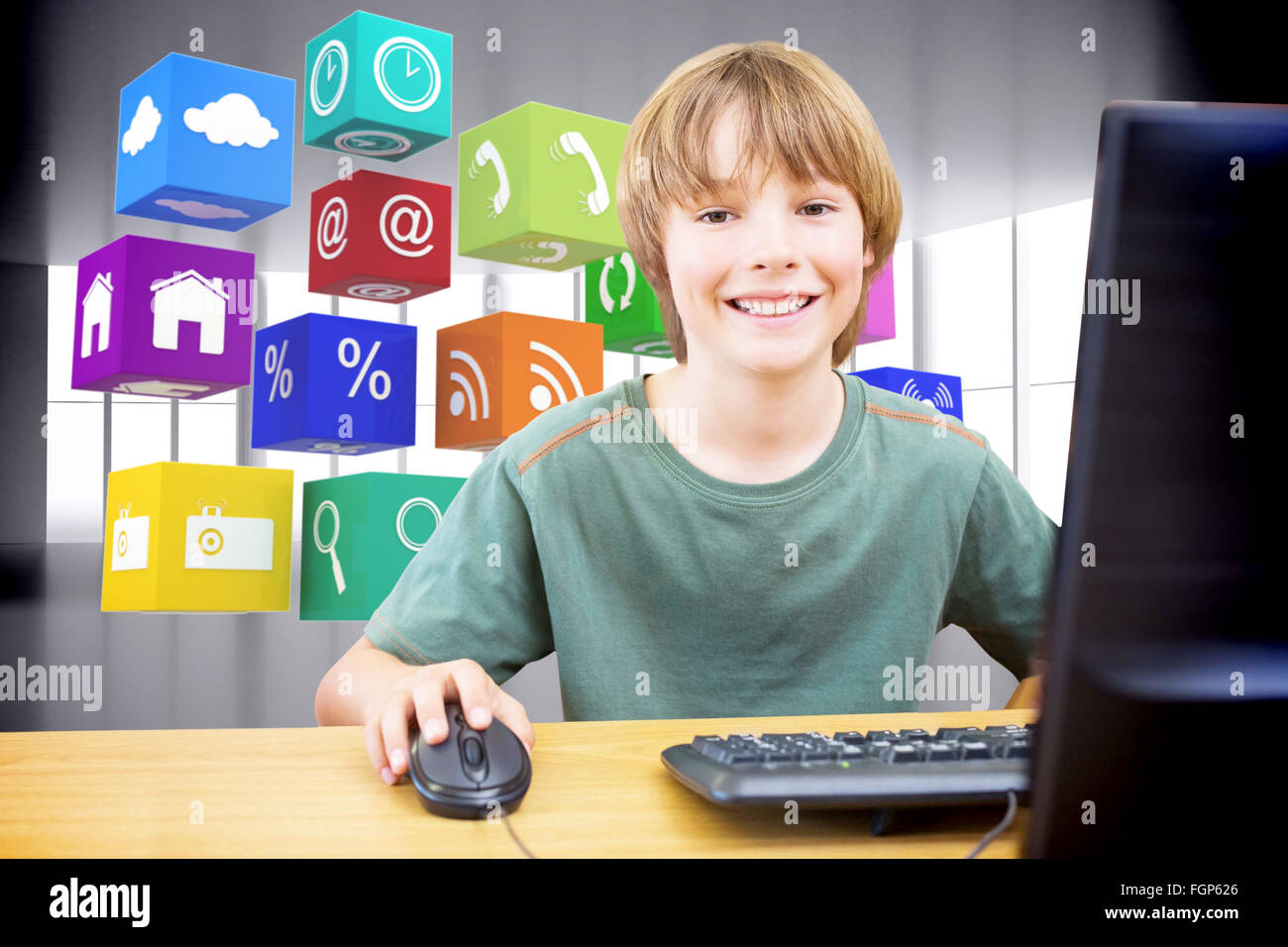 Composite image of school kid on computer Stock Photo - Alamy