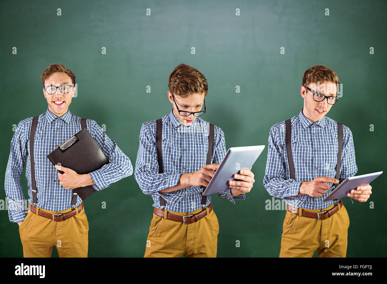Composite image of nerd with tablet pc Stock Photo - Alamy