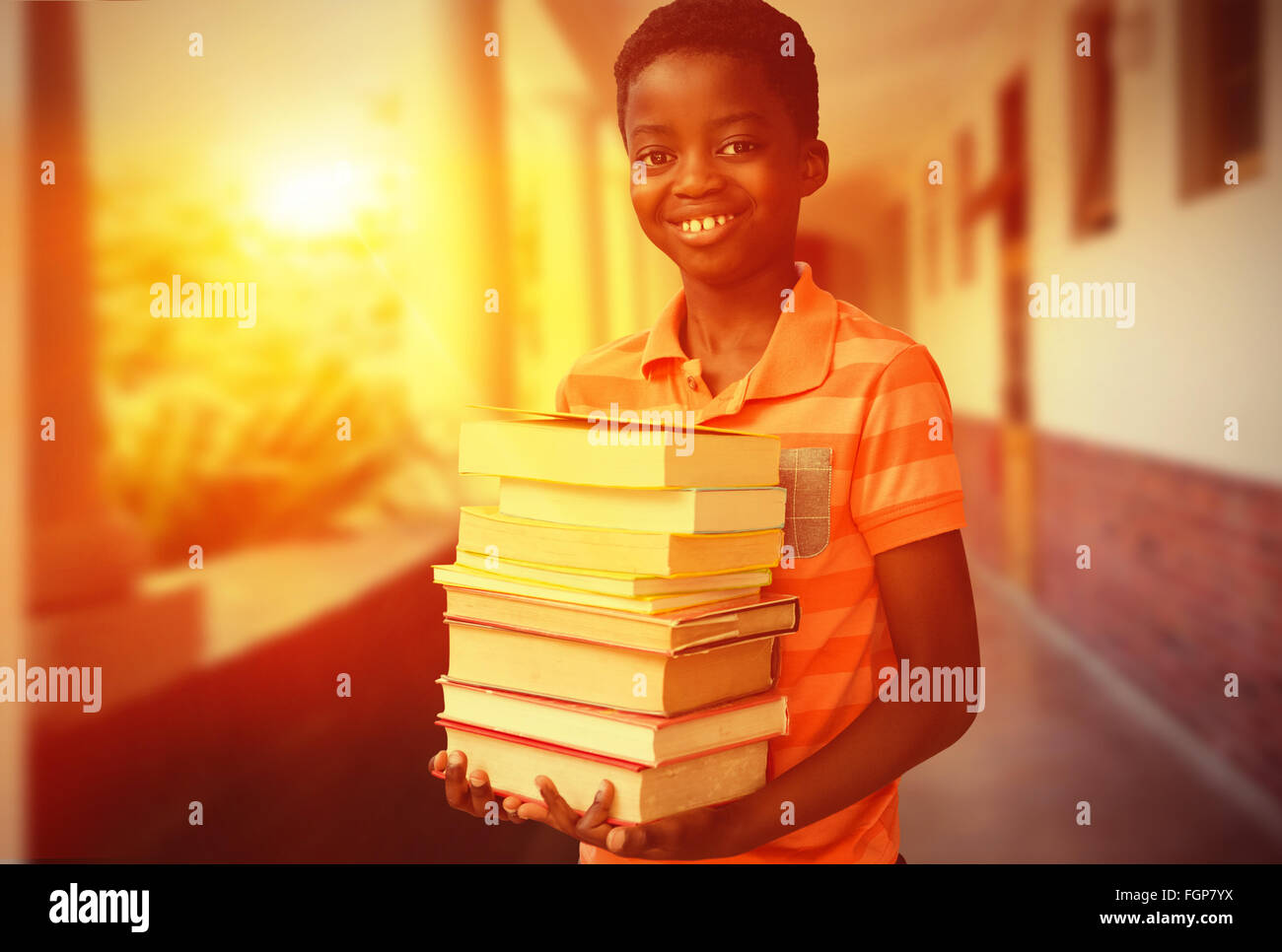 Boy carrying books library hi-res stock photography and images - Alamy