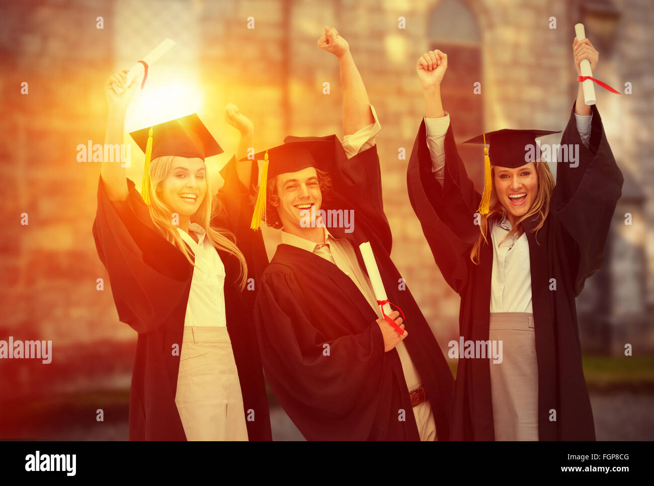 Graduate raising mortarboard diploma hi-res stock photography and ...