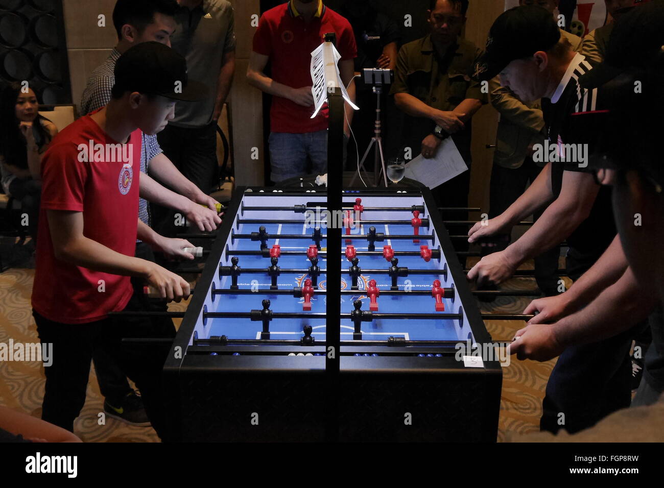 A match between Singapore and USA for a Doubles Championship trophy ...