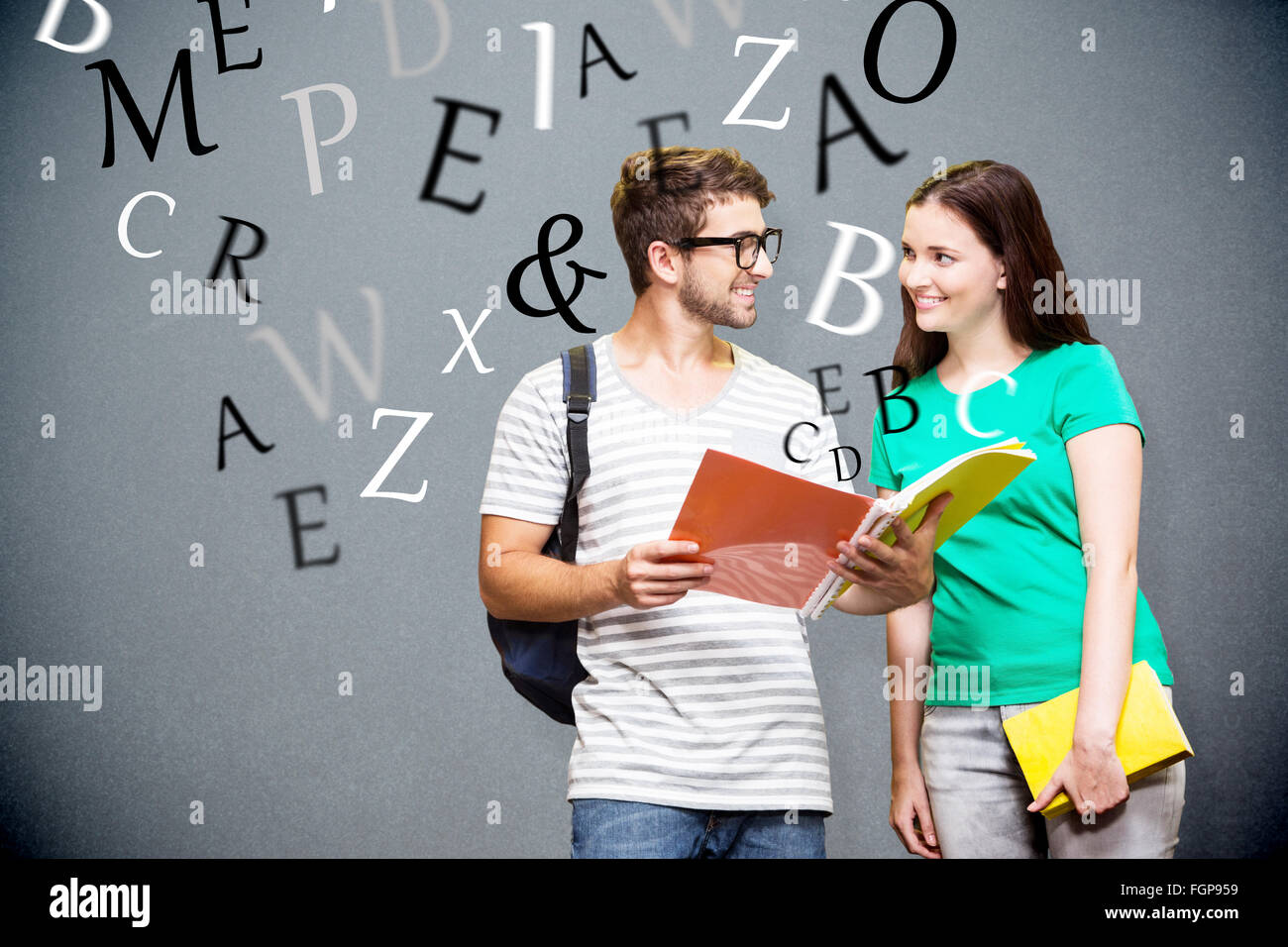 Composite image of students reading in the library Stock Photo - Alamy