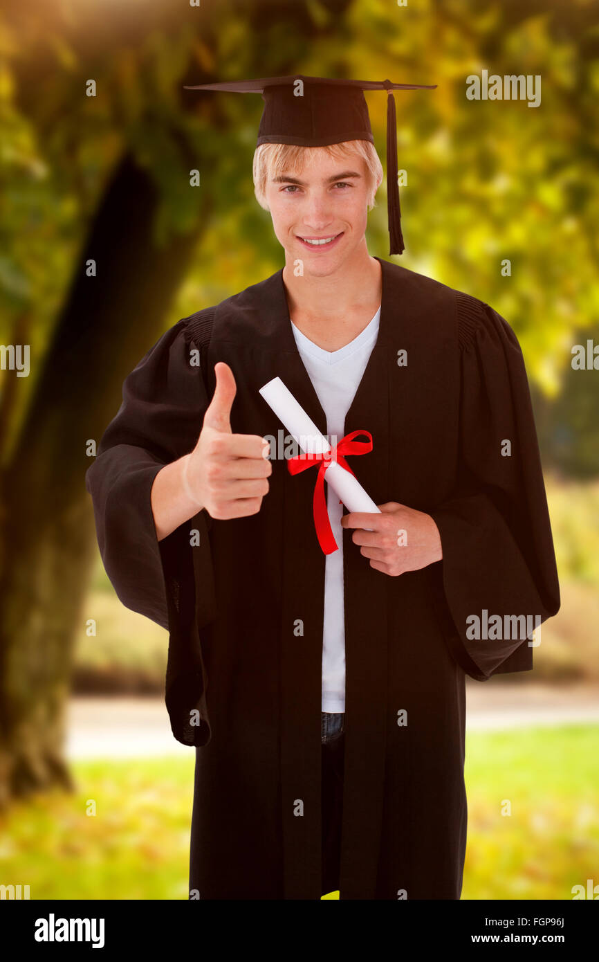 Composite image of happy teen guy celebrating graduation Stock Photo ...