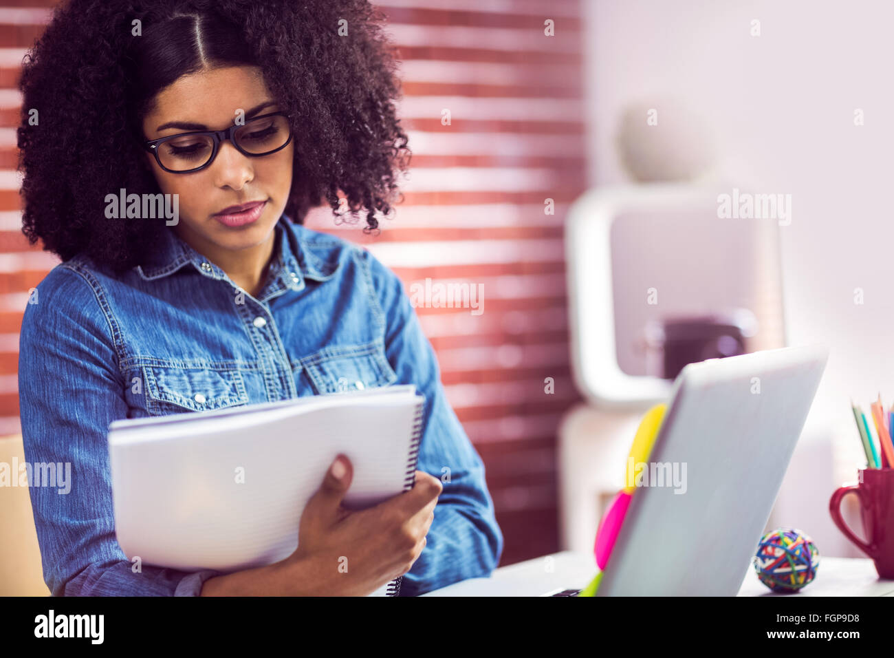 Business woman holding reports looking hi-res stock photography and ...
