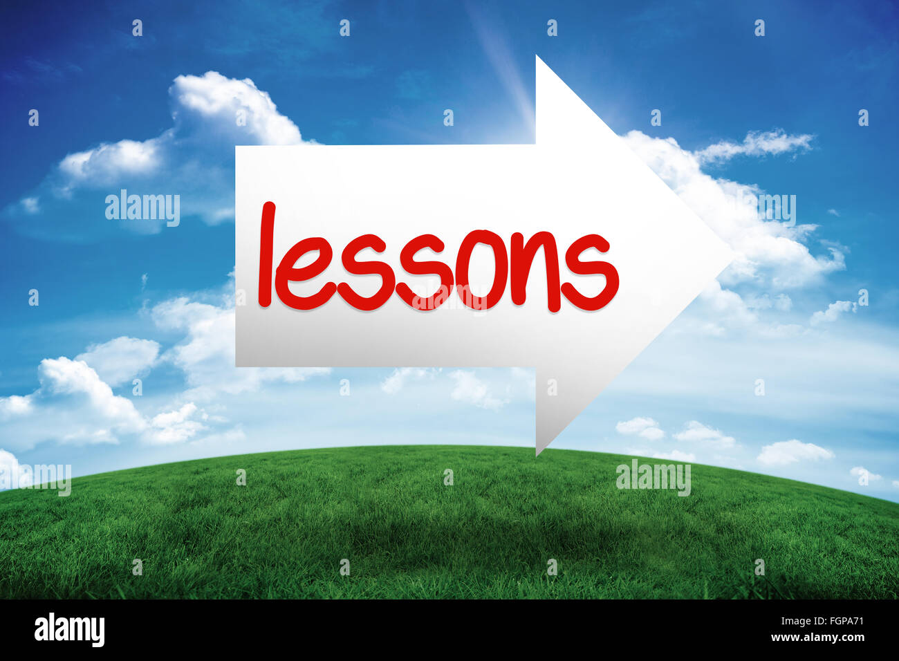 Lessons against green hill under blue sky Stock Photo - Alamy