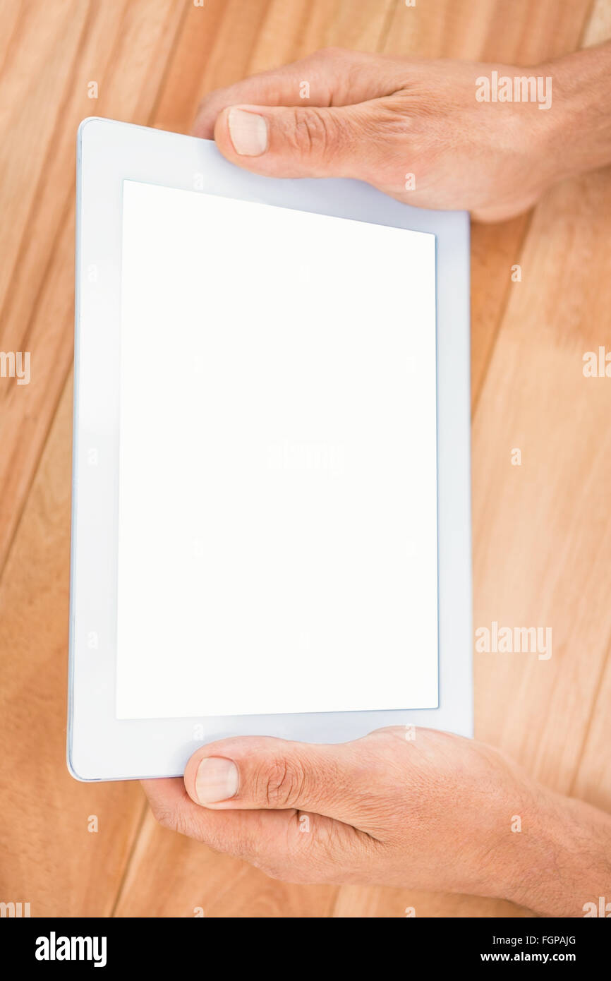 Hands holding blank screen tablet Stock Photo - Alamy