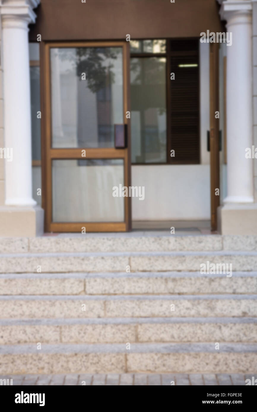 Large building with opened door Stock Photo - Alamy