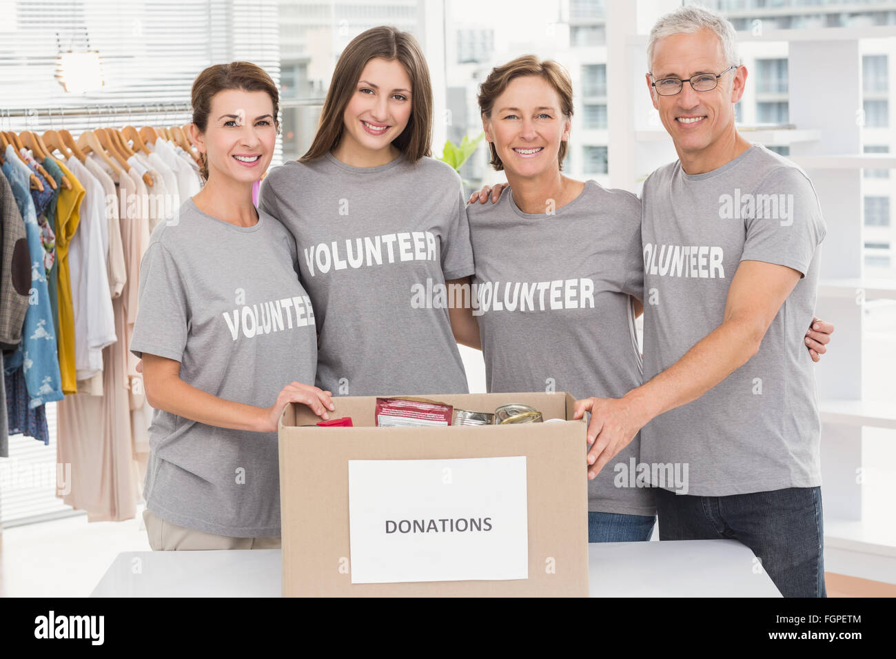 Putting arms around hi-res stock photography and images - Alamy