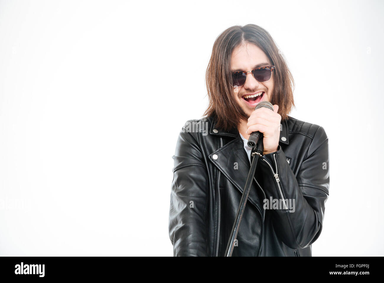 Handsome young rock singer in black leather jacket and sunglasses ...