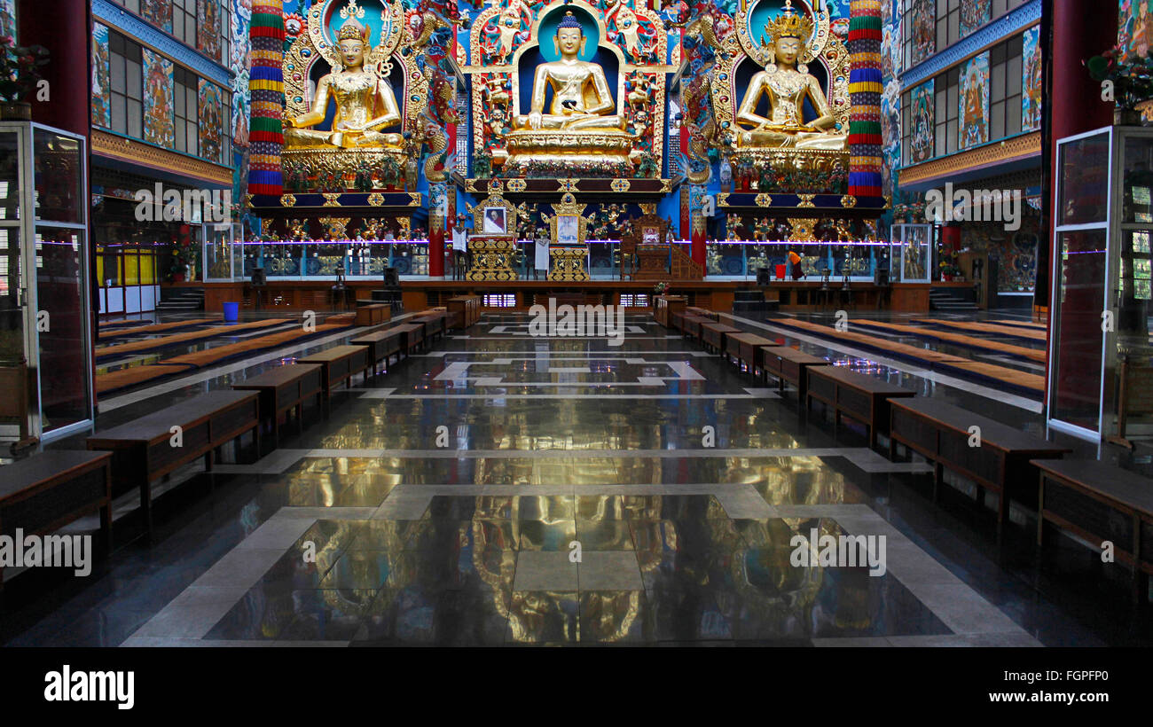 Golden statues of Guru Padmasambhava, Buddha Shakyamuni and Amitayus ...