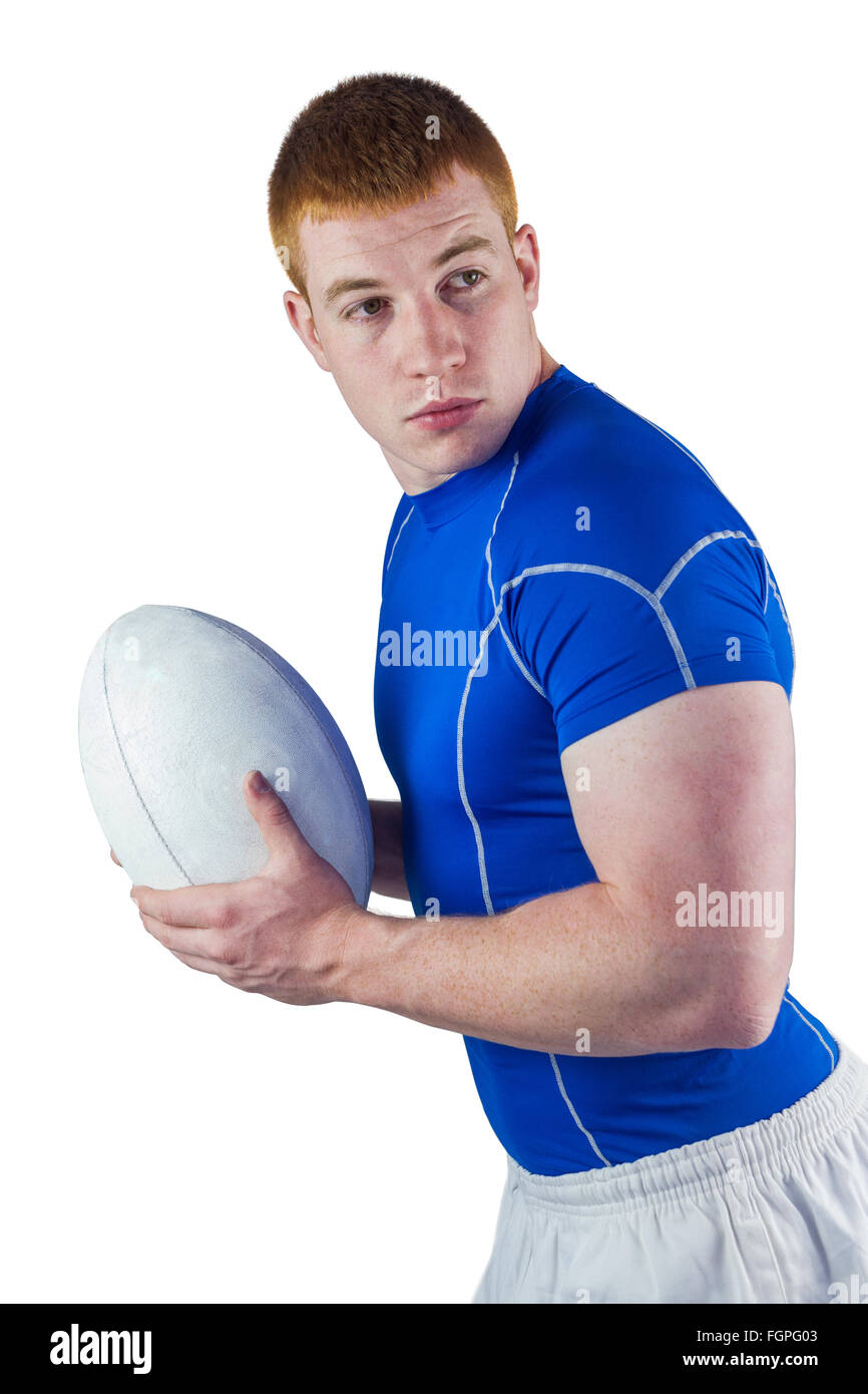 Rugby player running with the rugby ball Stock Photo - Alamy
