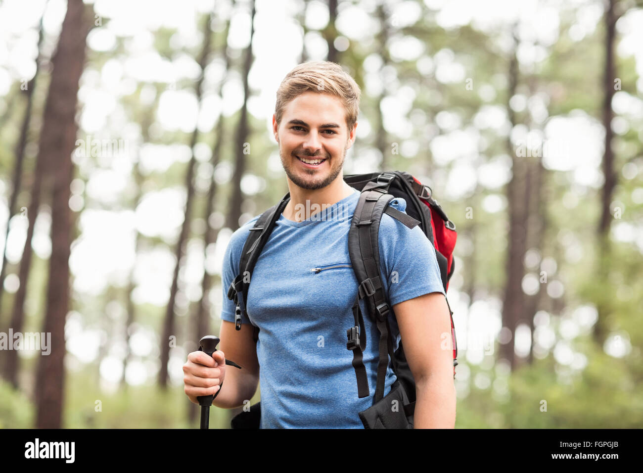 Portrait of a young handsome hiker Stock Photo - Alamy